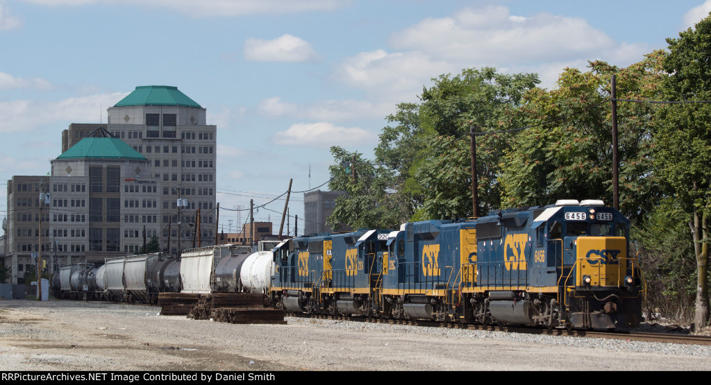 CSX 6456 leads J783 local.